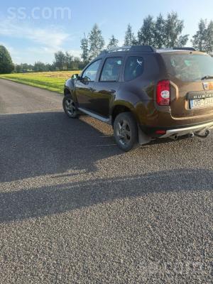 Brown Dacia Duster 2013 in Riga, with an engine capacity of 1.60 L and mileage of 181 thousand km for 4900 €, photo 14 on AUTOMOTO.COM.LV