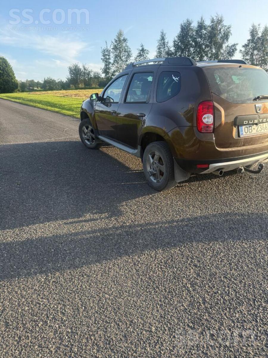 Brown Dacia Duster 2013 in Riga, with an engine capacity of 1.60 L and mileage of 181 thousand km for 4900 €, photo 14 on AUTOMOTO.COM.LV