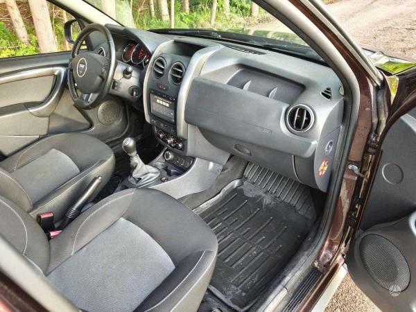 Brown Dacia Duster 2016 in Vilnius, with an engine capacity of 1.46 L and mileage of 156 thousand km for 3650 €, photo 3 on AUTOMOTO.COM.LV
