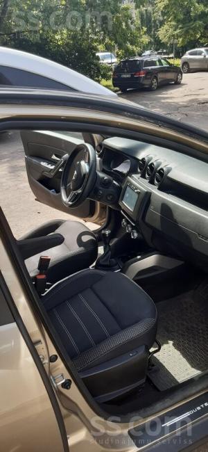 Brown Dacia Duster 2018 in Riga, with an engine capacity of 1.60 L and mileage of 76 thousand km for 11000 €, photo 14 on AUTOMOTO.COM.LV