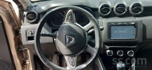 Brown Dacia Duster 2018 in Riga, with an engine capacity of 1.60 L and mileage of 76 thousand km for 11000 €, photo 16 on AUTOMOTO.COM.LV