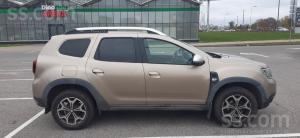 Brown Dacia Duster 2018 in Riga, with an engine capacity of 1.60 L and mileage of 76 thousand km for 9800 €, photo 3 on AUTOMOTO.COM.LV