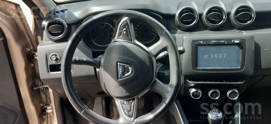Brown Dacia Duster 2018 in Riga, with an engine capacity of 1.60 L and mileage of 76 thousand km for 9800 €, photo 7 on AUTOMOTO.COM.LV