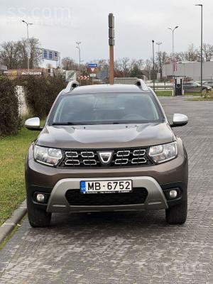 Brown Dacia Duster 2019 in Daugavpils, with an engine capacity of 1.60 L and mileage of 115 thousand km for 11500 €, photo 5 on AUTOMOTO.COM.LV