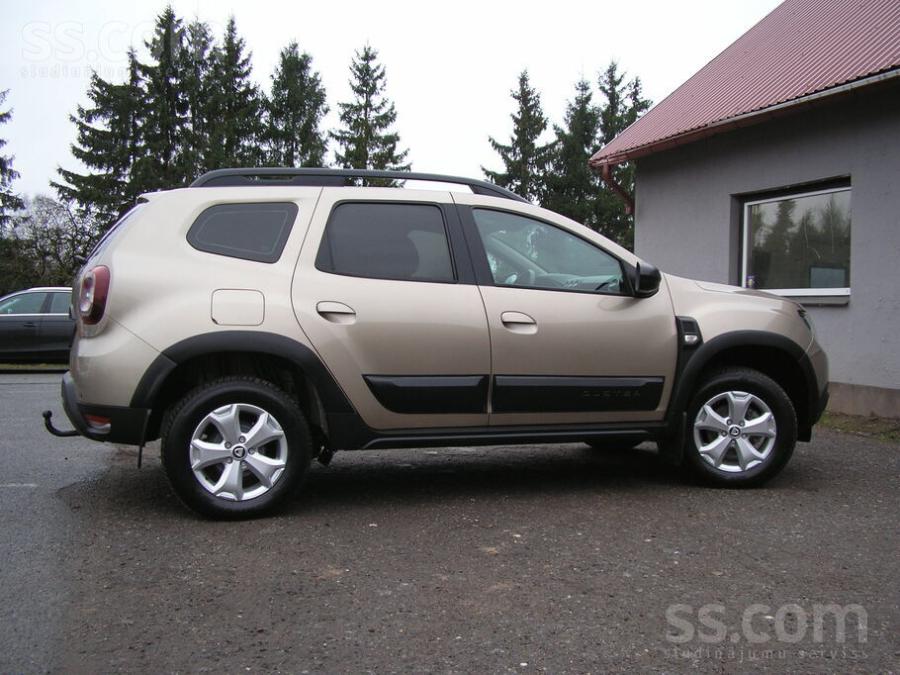 Brown Dacia Duster 2021 in Riga, with an engine capacity of 1.00 L and mileage of 0 thousand km for 9950 €, photo 3 on AUTOMOTO.COM.LV