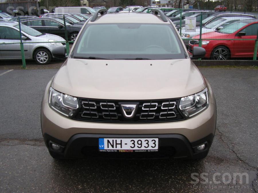 Brown Dacia Duster 2021 in Riga, with an engine capacity of 1.00 L and mileage of 0 thousand km for 9950 €, photo 5 on AUTOMOTO.COM.LV