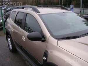 Brown Dacia Duster 2021 in Riga, with an engine capacity of 1.00 L and mileage of 0 thousand km for 9950 €, photo 11 on AUTOMOTO.COM.LV