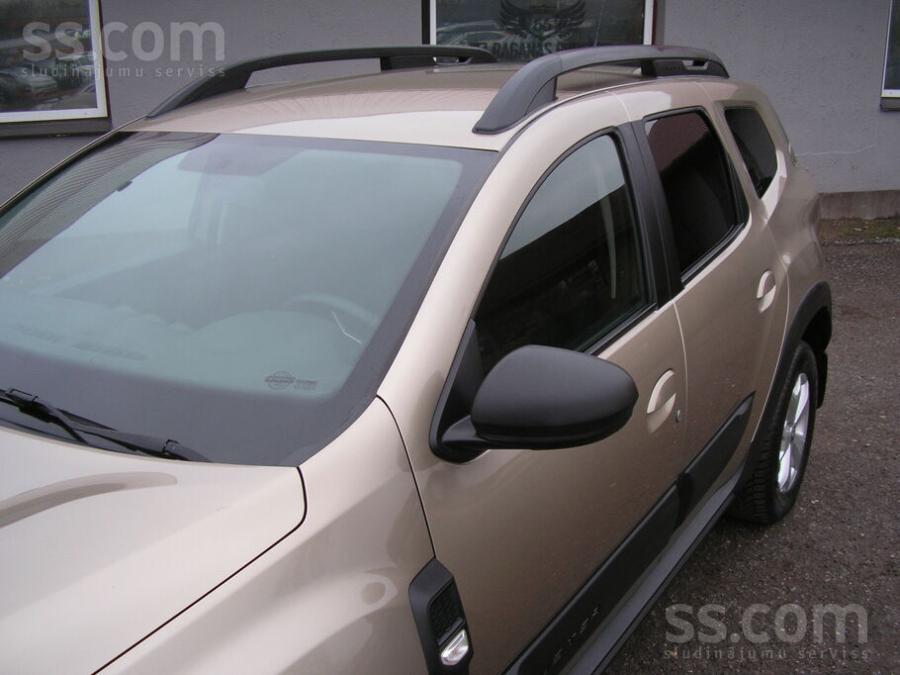 Brown Dacia Duster 2021 in Riga, with an engine capacity of 1.00 L and mileage of 0 thousand km for 9950 €, photo 13 on AUTOMOTO.COM.LV