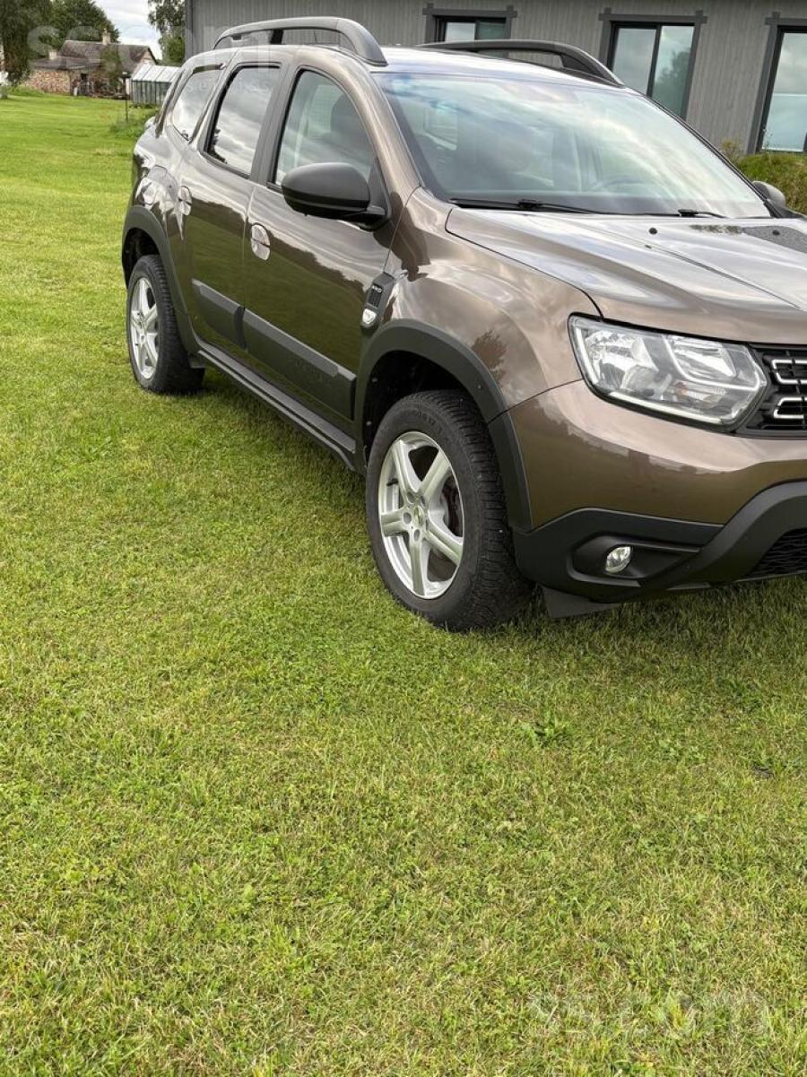 Brown Dacia Duster 2021 in Jelgava, with an engine capacity of 1.50 L and mileage of 87 thousand km for 14450 €, photo 3 on AUTOMOTO.COM.LV