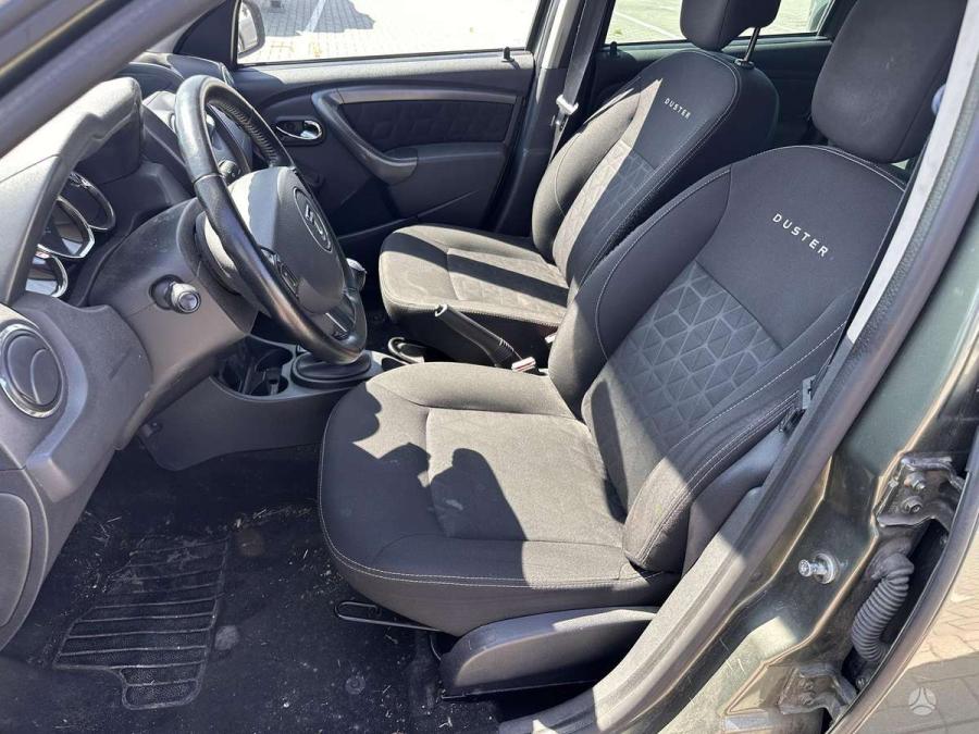 Green Dacia Duster 2014 in Taurage, with an engine capacity of 1.20 L and mileage of 166 thousand km for 4400 €, photo 8 on AUTOMOTO.COM.LV