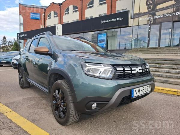 Green Dacia Duster 2023 in Riga, with an engine capacity of 1.00 L and mileage of 62 thousand km for 7700 €, photo 1 on AUTOMOTO.COM.LV