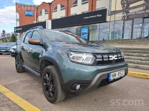 Green Dacia Duster 2023 in Riga, with an engine capacity of 1.00 L and mileage of 62 thousand km for 7700 €, photo 1 on AUTOMOTO.COM.LV