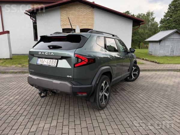 Green Dacia Duster 2024 in Ogre, with an engine capacity of 1.20 L and mileage of 62 thousand km for 21900 €, photo 5 on AUTOMOTO.COM.LV