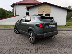 Green Dacia Duster 2024 in Ogre, with an engine capacity of 1.20 L and mileage of 62 thousand km for 19900 €, photo 5 on AUTOMOTO.COM.LV
