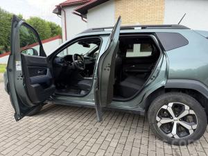 Green Dacia Duster 2024 in Ogre, with an engine capacity of 1.20 L and mileage of 62 thousand km for 19900 €, photo 7 on AUTOMOTO.COM.LV