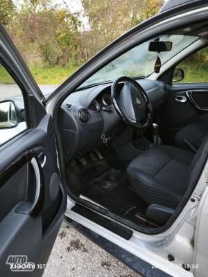 Grey Dacia Duster 2012 in Vilnius, with an engine capacity of 1.60 L and mileage of 142 thousand km for 4900 €, photo 10 on AUTOMOTO.COM.LV
