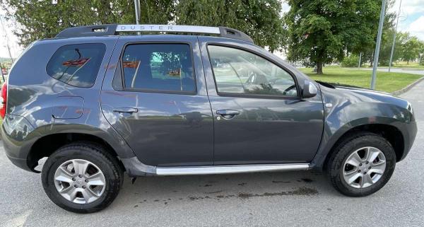 Grey Dacia Duster 2013 in Taurage, with an engine capacity of 1.20 L and mileage of 115 thousand km for 3900 €, photo 8 on AUTOMOTO.COM.LV