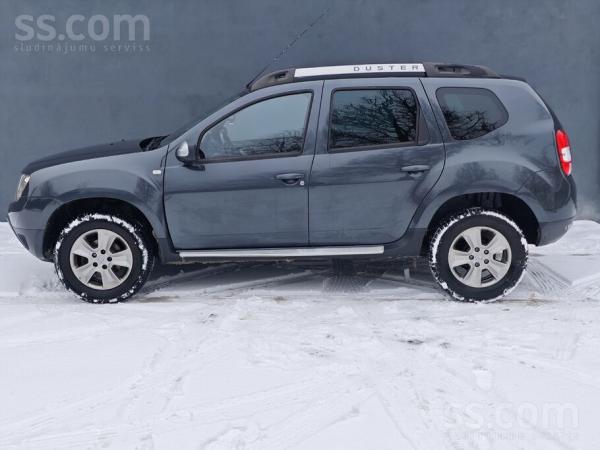 Grey Dacia Duster 2015 in Ogre, with an engine capacity of 1.20 L and mileage of 88 thousand km for 6995 €, photo 5 on AUTOMOTO.COM.LV