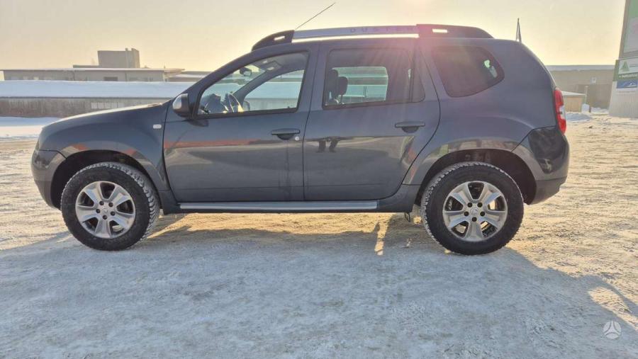 Grey Dacia Duster 2015 in Taurage, with an engine capacity of 1.46 L and mileage of 272 thousand km for 6100 €, photo 4 on AUTOMOTO.COM.LV