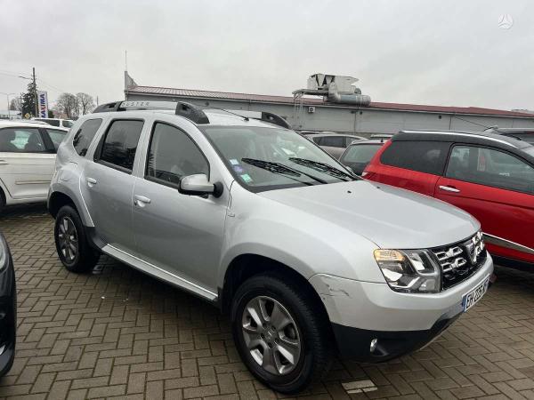 Grey Dacia Duster 2016 in Taurage, with an engine capacity of 1.20 L and mileage of 141 thousand km for 5300 €, photo 3 on AUTOMOTO.COM.LV