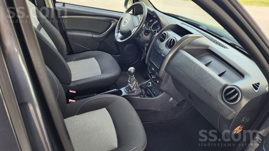 Grey Dacia Duster 2016 in Ogre, with an engine capacity of 1.20 L and mileage of 142 thousand km for 7750 €, photo 14 on AUTOMOTO.COM.LV