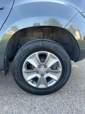 Grey Dacia Duster 2016 in Utena, with an engine capacity of 1.20 L and mileage of 174 thousand km for 6700 €, photo 12 on AUTOMOTO.COM.LV