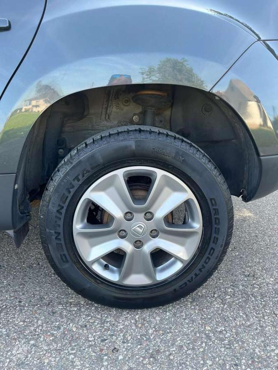 Grey Dacia Duster 2016 in Utena, with an engine capacity of 1.20 L and mileage of 174 thousand km for 6700 €, photo 12 on AUTOMOTO.COM.LV