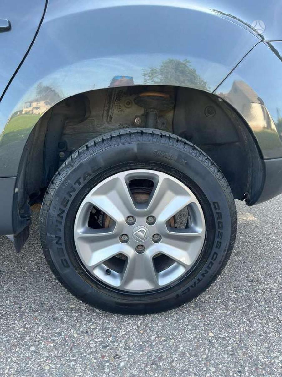 Grey Dacia Duster 2016 in Utena, with an engine capacity of 1.20 L and mileage of 174 thousand km for 5600 €, photo 21 on AUTOMOTO.COM.LV