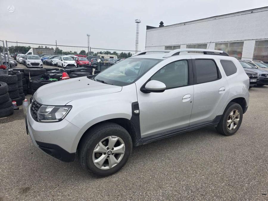 Grey Dacia Duster 2018 in Marijampole, with an engine capacity of 1.46 L and mileage of 265 thousand km for 7200 €, photo 1 on AUTOMOTO.COM.LV