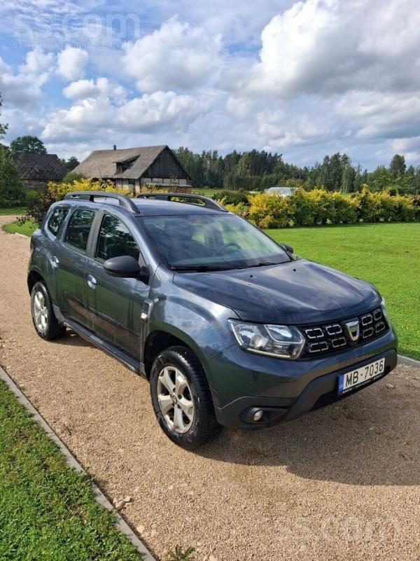 Grey Dacia Duster 2019 in Ogre, with an engine capacity of 1.60 L and mileage of 134 thousand km for 7400 €, photo 1 on AUTOMOTO.COM.LV