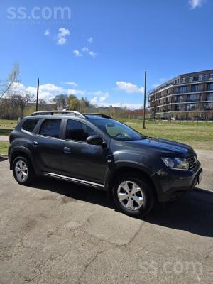 Grey Dacia Duster 2021 in Riga, with an engine capacity of 1.50 L and mileage of 128 thousand km for 12900 €, photo  on AUTOMOTO.COM.LV