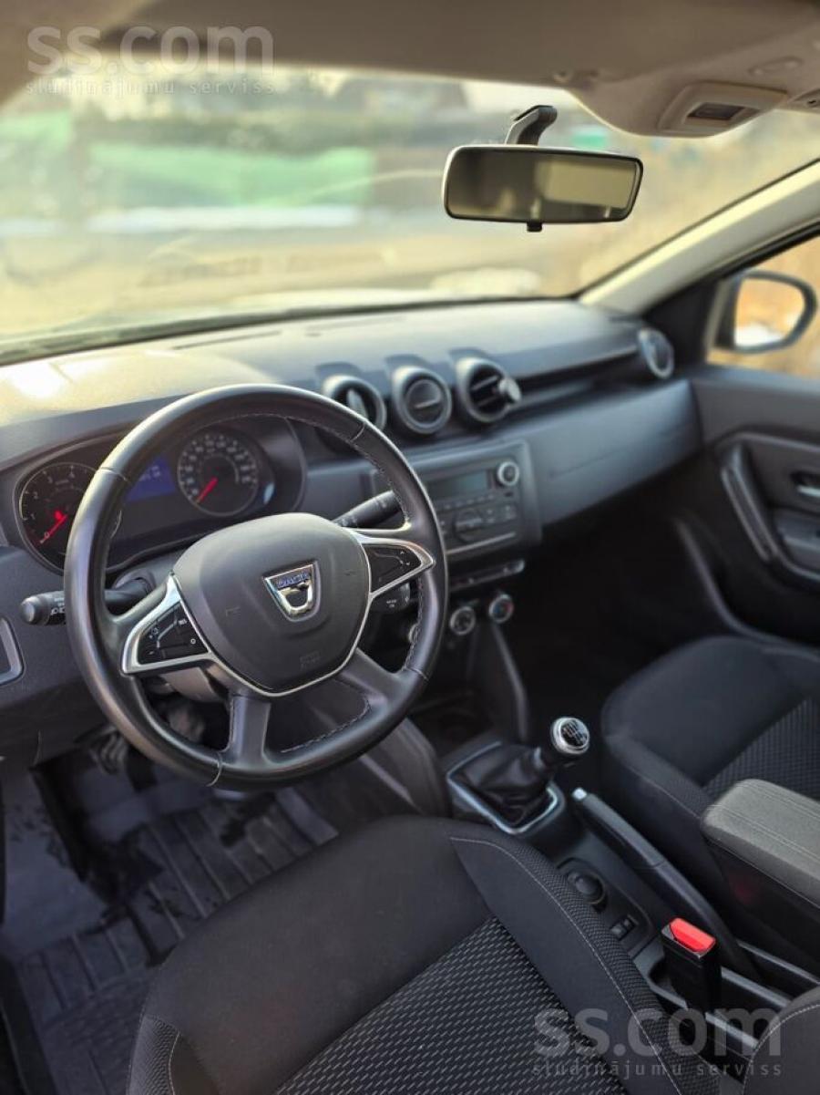 Grey Dacia Duster 2021 in Riga, with an engine capacity of 1.50 L and mileage of 128 thousand km for 12900 €, photo 4 on AUTOMOTO.COM.LV