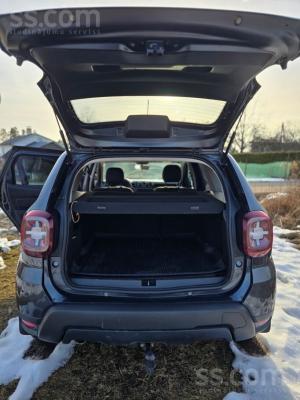 Grey Dacia Duster 2021 in Riga, with an engine capacity of 1.50 L and mileage of 128 thousand km for 12900 €, photo 10 on AUTOMOTO.COM.LV