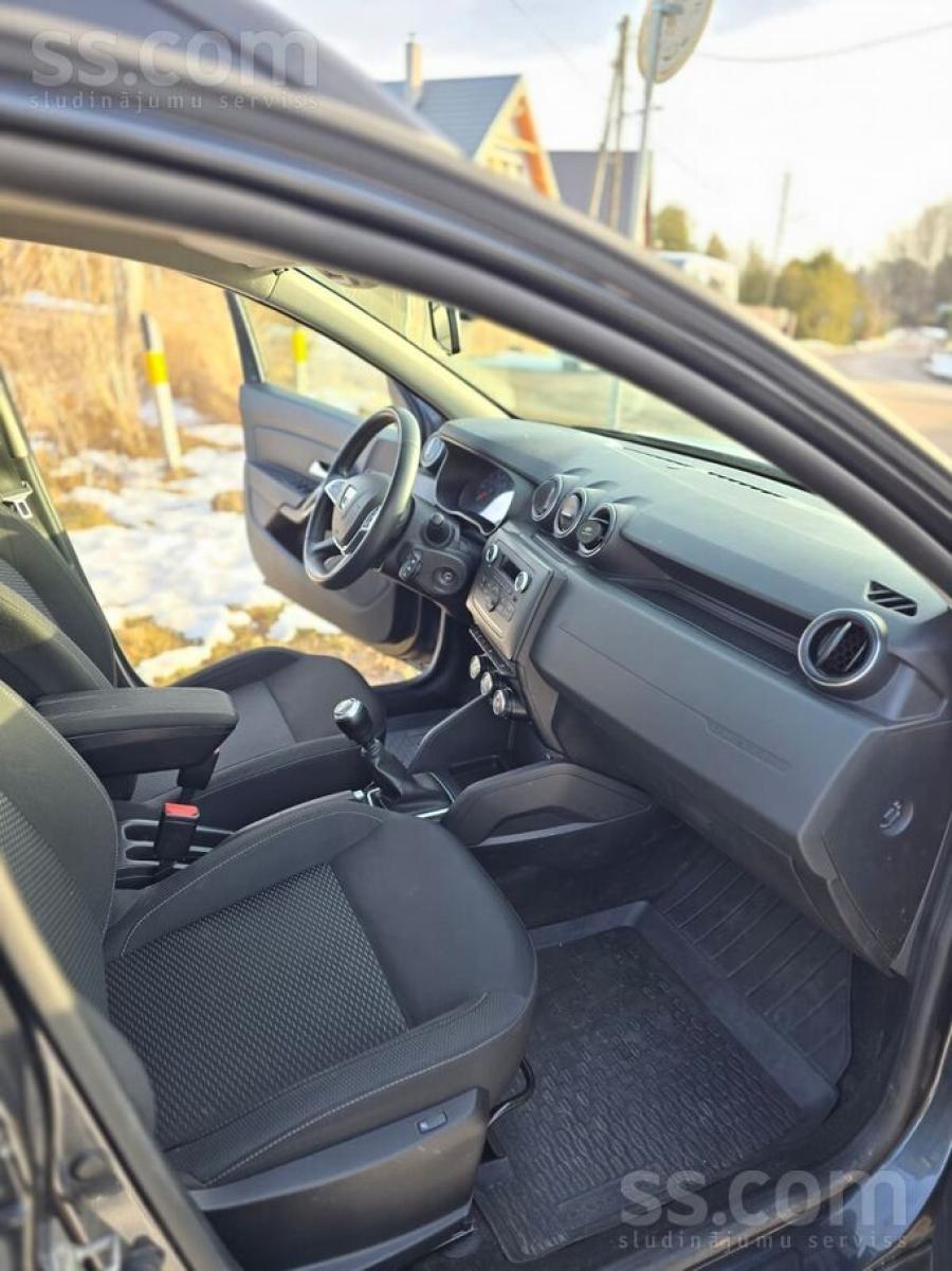 Grey Dacia Duster 2021 in Riga, with an engine capacity of 1.50 L and mileage of 128 thousand km for 12900 €, photo 15 on AUTOMOTO.COM.LV