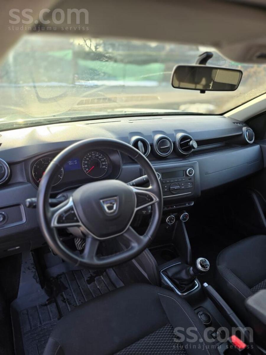 Grey Dacia Duster 2021 in Riga, with an engine capacity of 1.50 L and mileage of 128 thousand km for 12900 €, photo 20 on AUTOMOTO.COM.LV