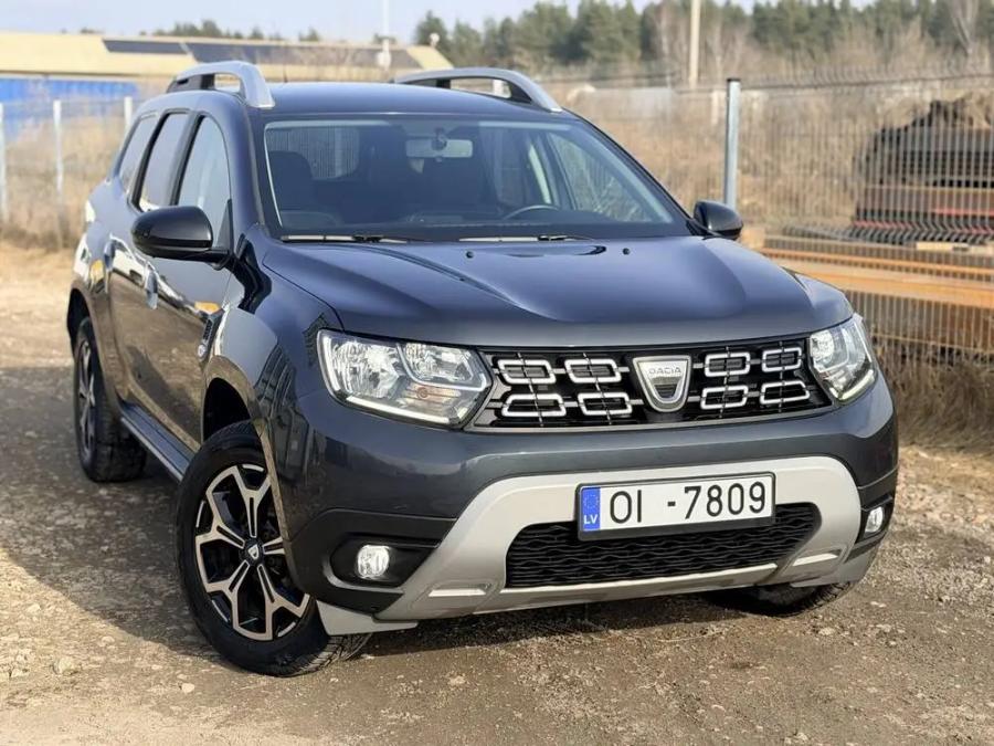 Grey Dacia Duster 2021 in Riga, with an engine capacity of 1.50 L and mileage of 140 thousand km for 12995 €, photo 1 on AUTOMOTO.COM.LV