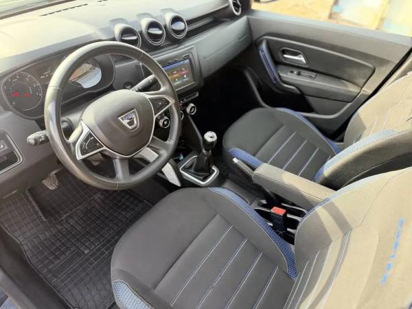 Grey Dacia Duster 2021 in Riga, with an engine capacity of 1.50 L and mileage of 140 thousand km for 12995 €, photo 9 on AUTOMOTO.COM.LV