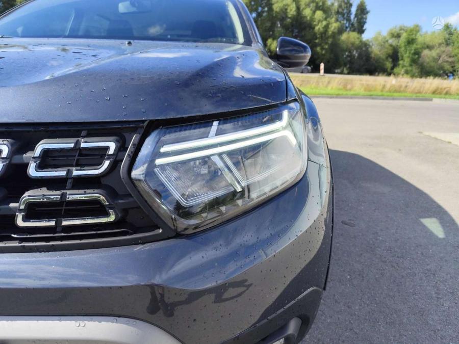 Grey Dacia Duster 2021 in Taurage, with an engine capacity of 1.00 L and mileage of 66 thousand km for 8200 €, photo 12 on AUTOMOTO.COM.LV