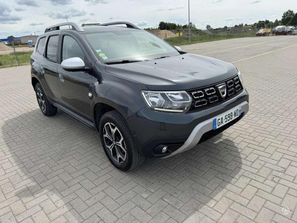 Grey Dacia Duster 2021 in Taurage, with an engine capacity of 1.46 L and mileage of 260 thousand km for 8600 €, photo 3 on AUTOMOTO.COM.LV