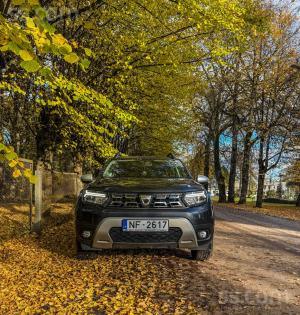 Grey Dacia Duster 2022 in Riga, with an engine capacity of 1.00 L and mileage of 92 thousand km for 11500 €, photo 2 on AUTOMOTO.COM.LV