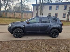 Grey Dacia Duster 2022 in Riga, with an engine capacity of 1.00 L and mileage of 39 thousand km for 16500 €, photo 3 on AUTOMOTO.COM.LV