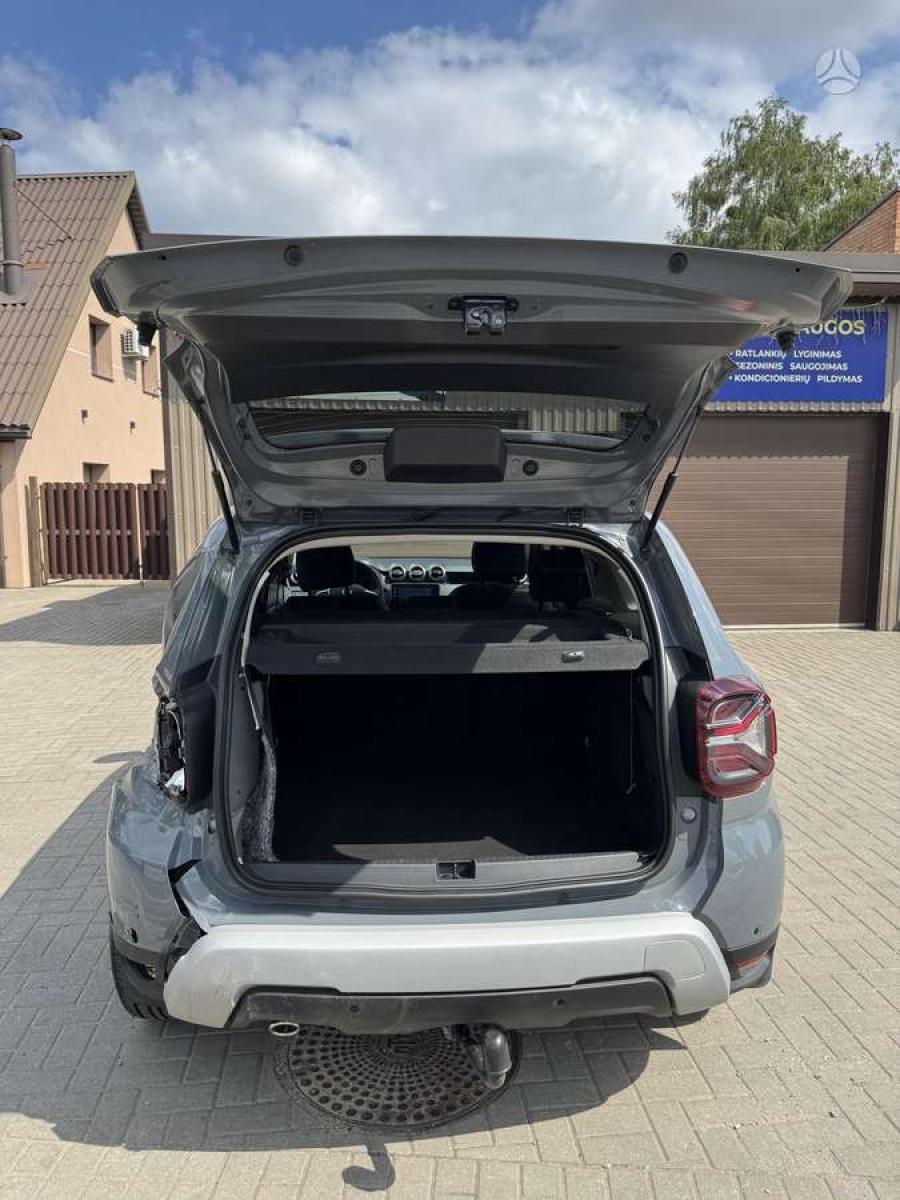 Grey Dacia Duster 2022 in Kaunas, with an engine capacity of 1.00 L and mileage of 21 thousand km for 7400 €, photo 14 on AUTOMOTO.COM.LV