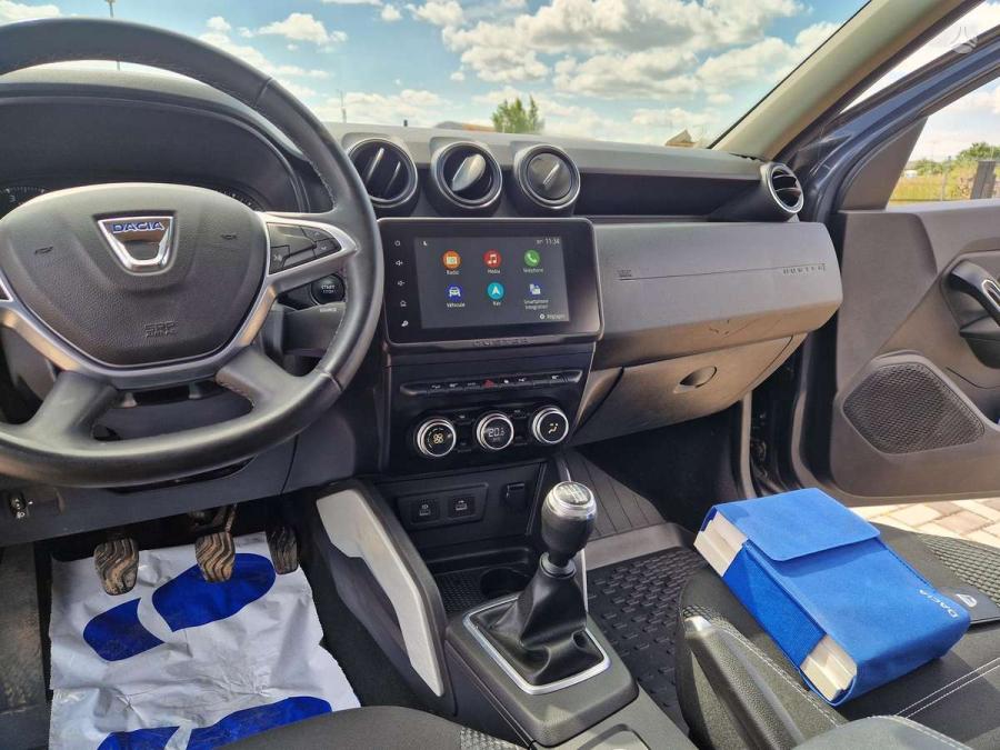 Grey Dacia Duster 2022 in Taurage, with an engine capacity of 1.46 L and mileage of 185 thousand km for 11700 €, photo 12 on AUTOMOTO.COM.LV