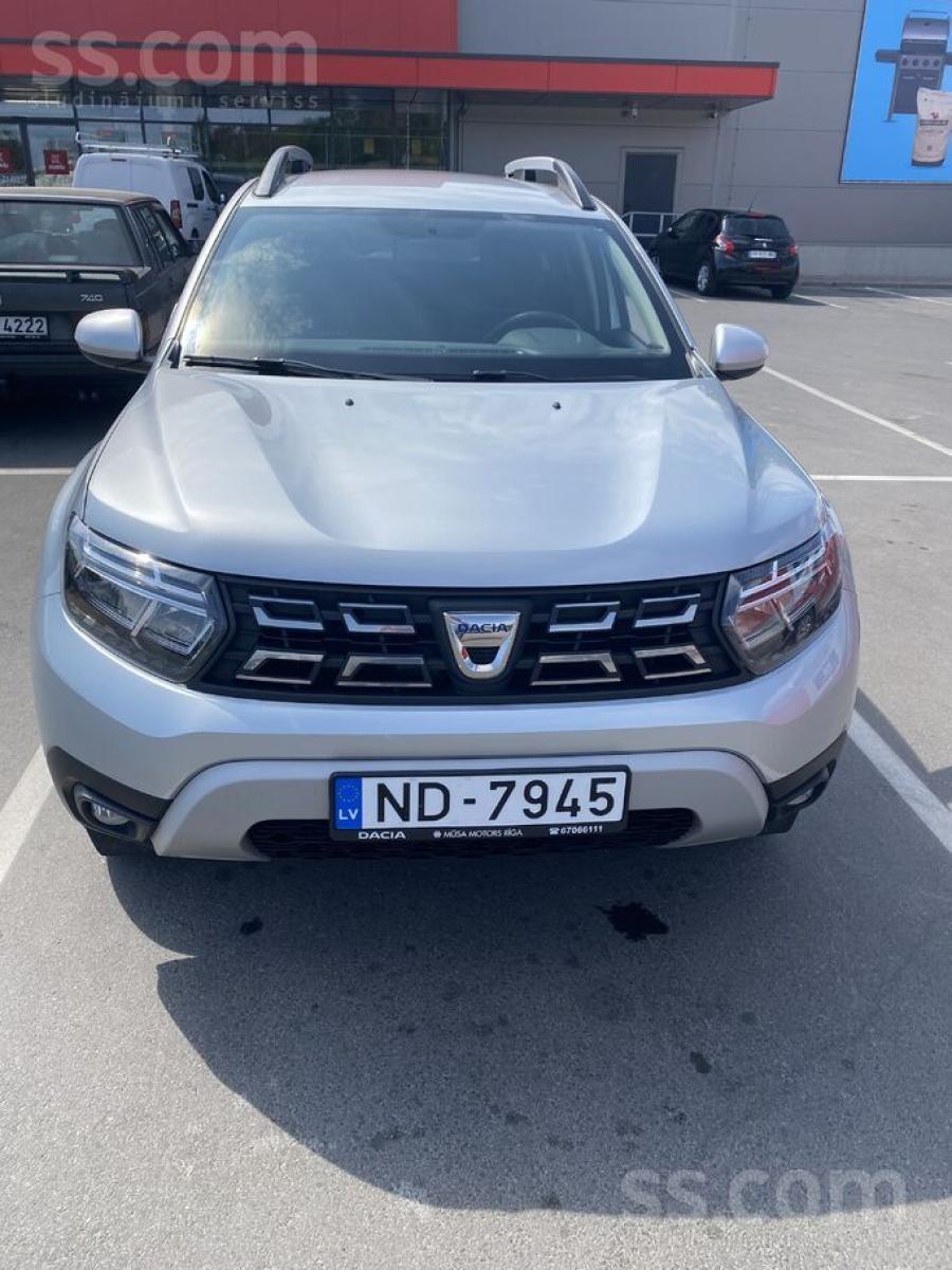 Grey Dacia Duster 2022 in Riga, with an engine capacity of 1.50 L and mileage of 79 thousand km for 14190 €, photo 1 on AUTOMOTO.COM.LV