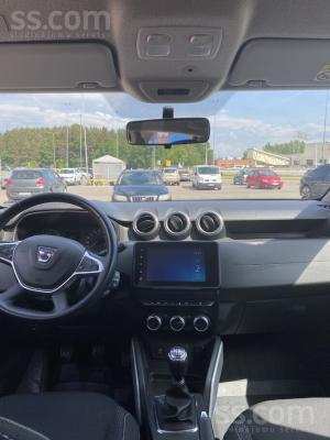 Grey Dacia Duster 2022 in Riga, with an engine capacity of 1.50 L and mileage of 79 thousand km for 14190 €, photo 6 on AUTOMOTO.COM.LV
