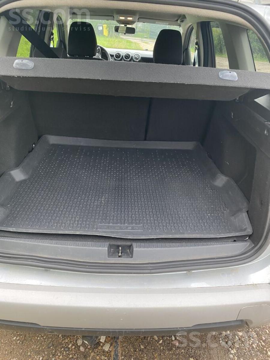 Grey Dacia Duster 2022 in Riga, with an engine capacity of 1.50 L and mileage of 79 thousand km for 14190 €, photo 12 on AUTOMOTO.COM.LV