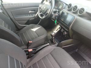 Grey Dacia Duster 2022 in Riga, with an engine capacity of 1.50 L and mileage of 181 thousand km for 12900 €, photo 6 on AUTOMOTO.COM.LV