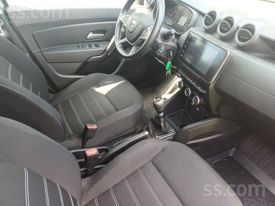 Grey Dacia Duster 2022 in Riga, with an engine capacity of 1.50 L and mileage of 181 thousand km for 12900 €, photo 6 on AUTOMOTO.COM.LV