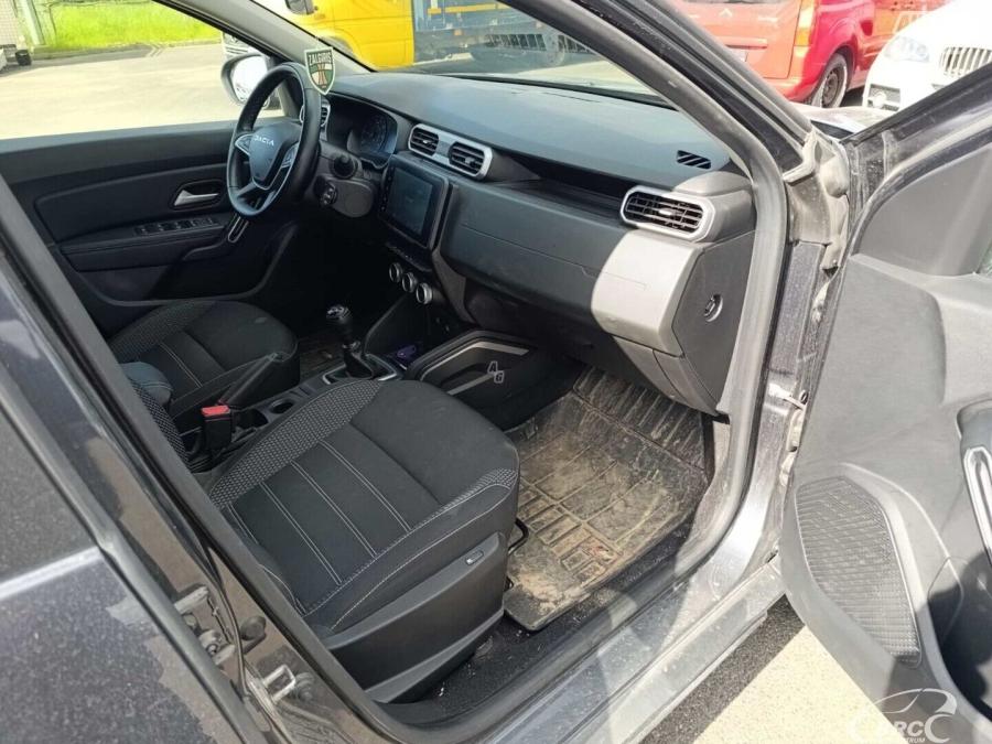 Grey Dacia Duster 2023 in Avizieniai, with an engine capacity of 1.00 L and mileage of 86 thousand km for 12500 €, photo 12 on AUTOMOTO.COM.LV