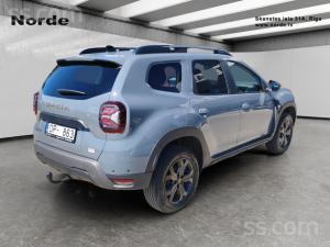 Grey Dacia Duster 2023 in Riga, with an engine capacity of 1.00 L and mileage of 57 thousand km for 14490 €, photo 5 on AUTOMOTO.COM.LV